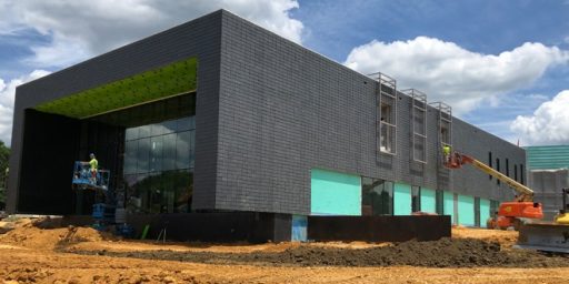 6 modern houses with natural slate roofing and rainscreen cladding